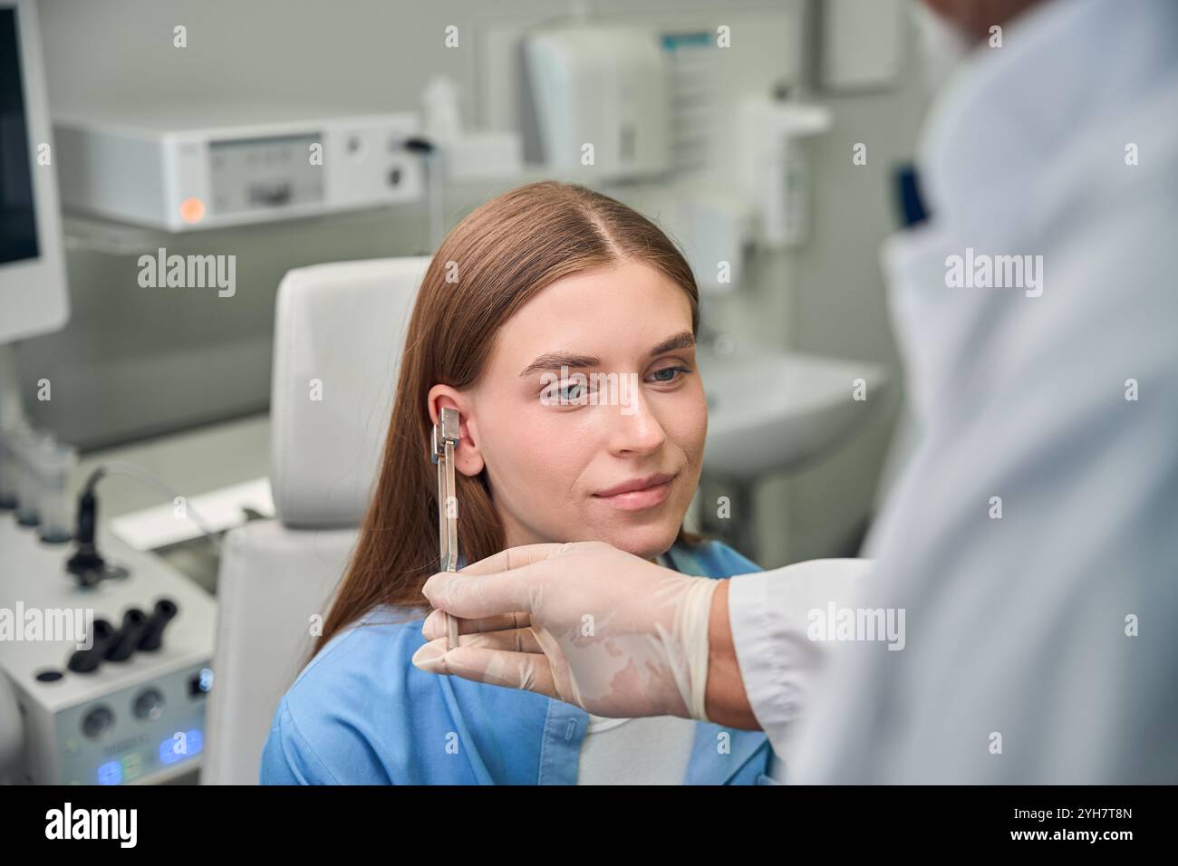 Woman tuning fork hi-res stock photography and images - Alamy