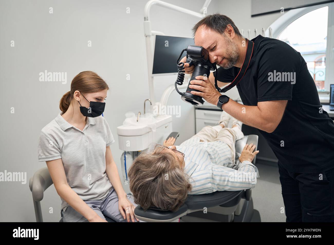 Specialist uses a special dental camera in his work Stock Photo - Alamy