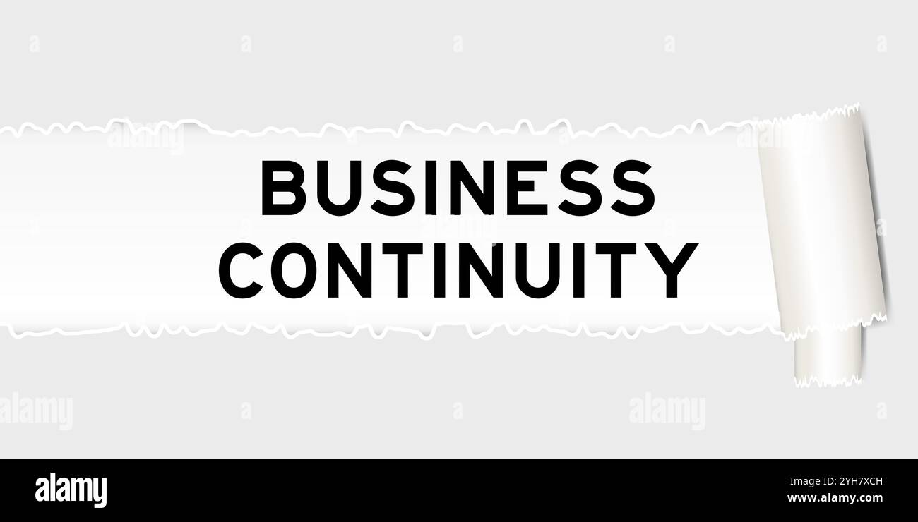 Ripped gray paper background that have word business continuity under ...