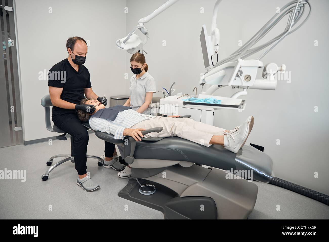 Lady in a dental chair hi-res stock photography and images - Alamy