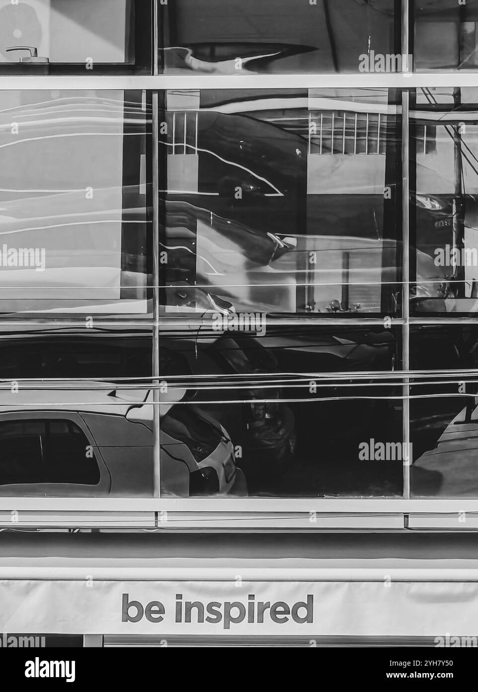 Be Inspired: Double Exposure concept. Cars reflections on Window Wall Exterior Stock Photo - Alamy