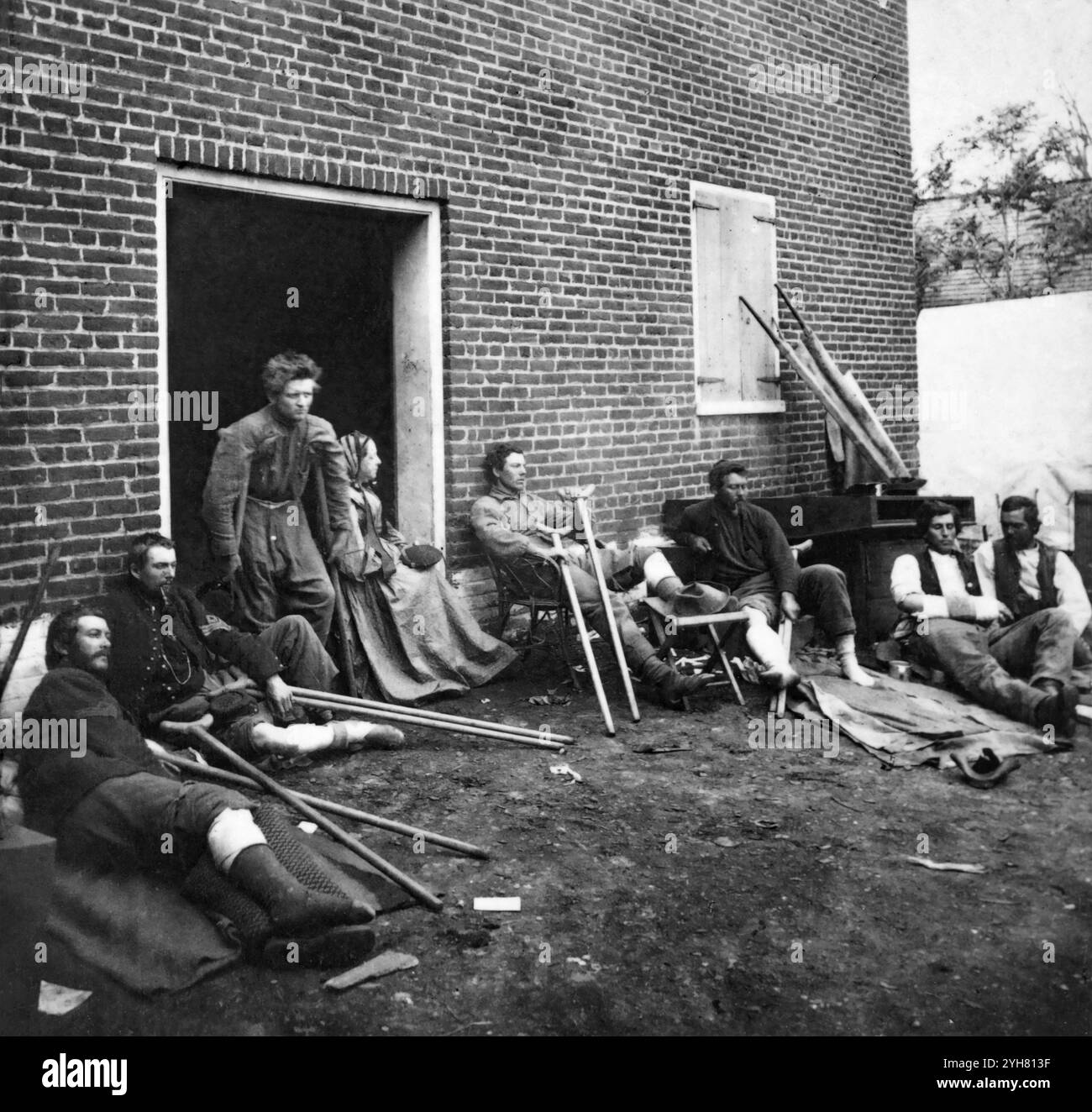 Created by James Gardner. Photograph shows soldiers outside a brick ...