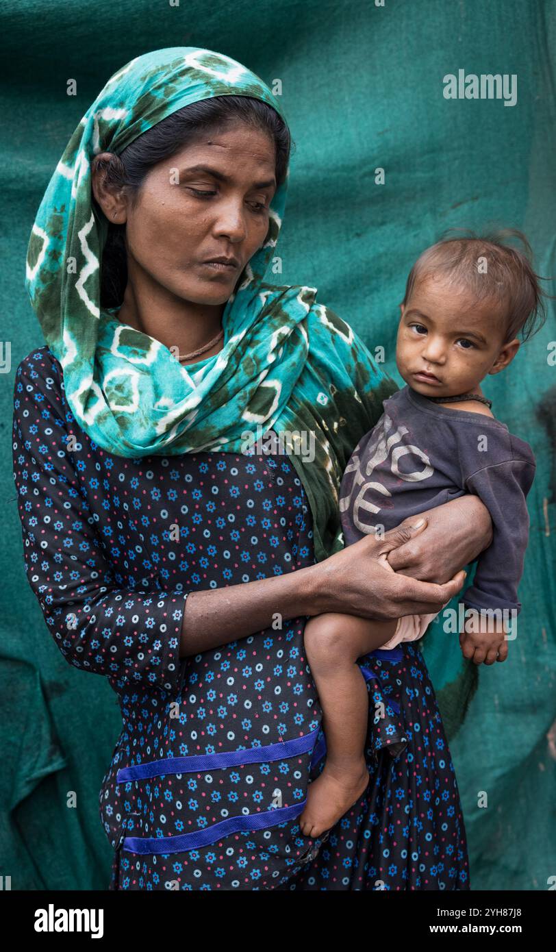Portrait of poor woman and baby, Ambaji, Gujarat, India Stock Photo - Alamy