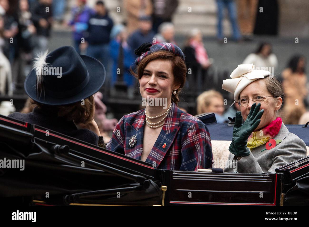 Participants in vibrant costumes and historic attire march in the ...