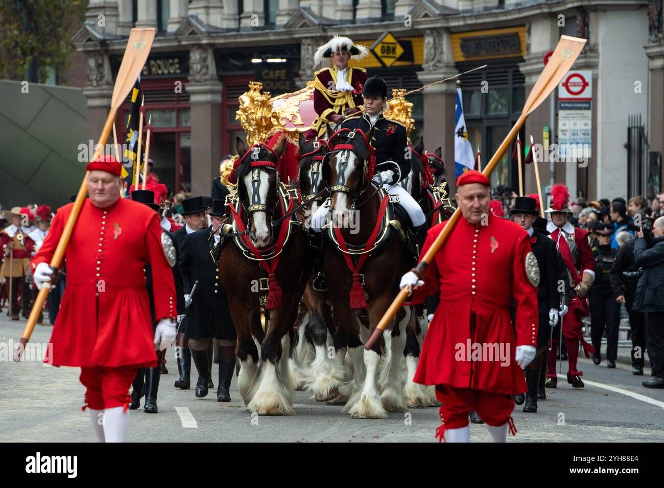 Participants in vibrant costumes and historic attire march in the ...