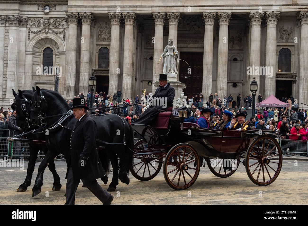Participants in vibrant costumes and historic attire march in the ...
