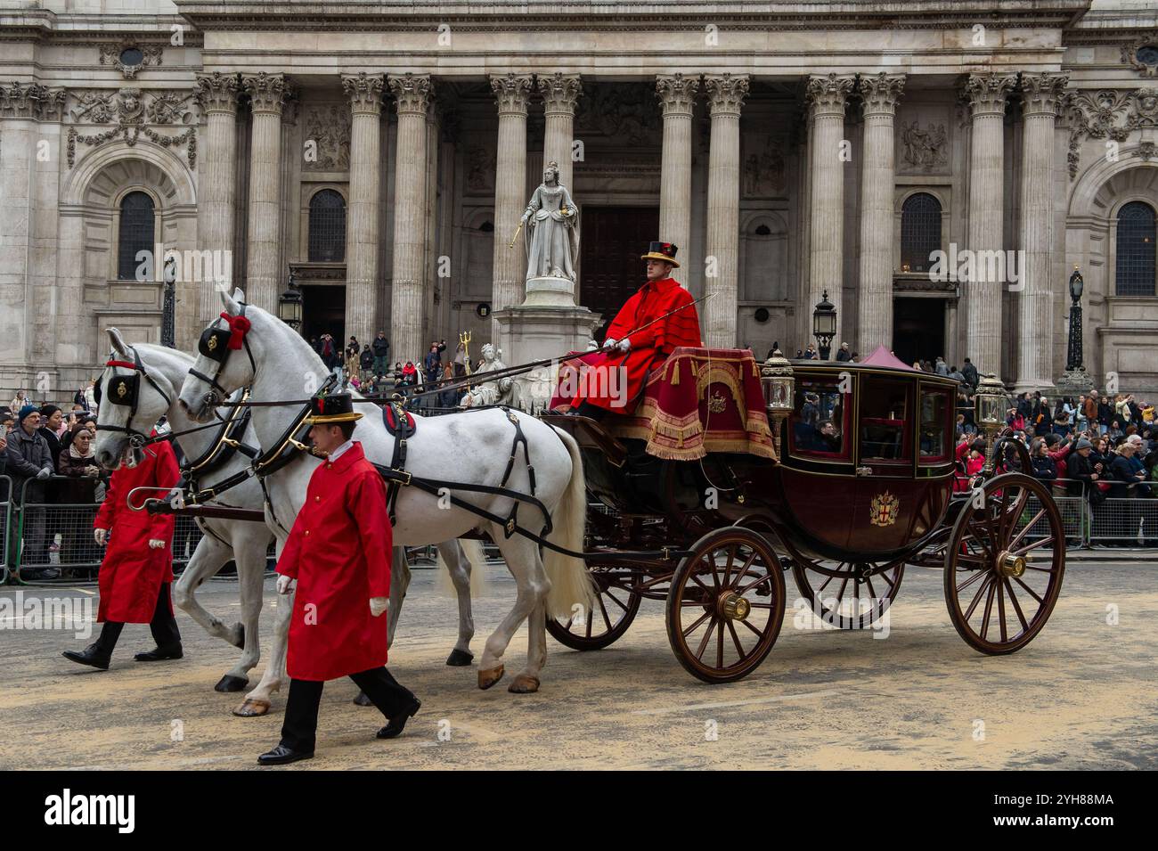Participants in vibrant costumes and historic attire march in the ...