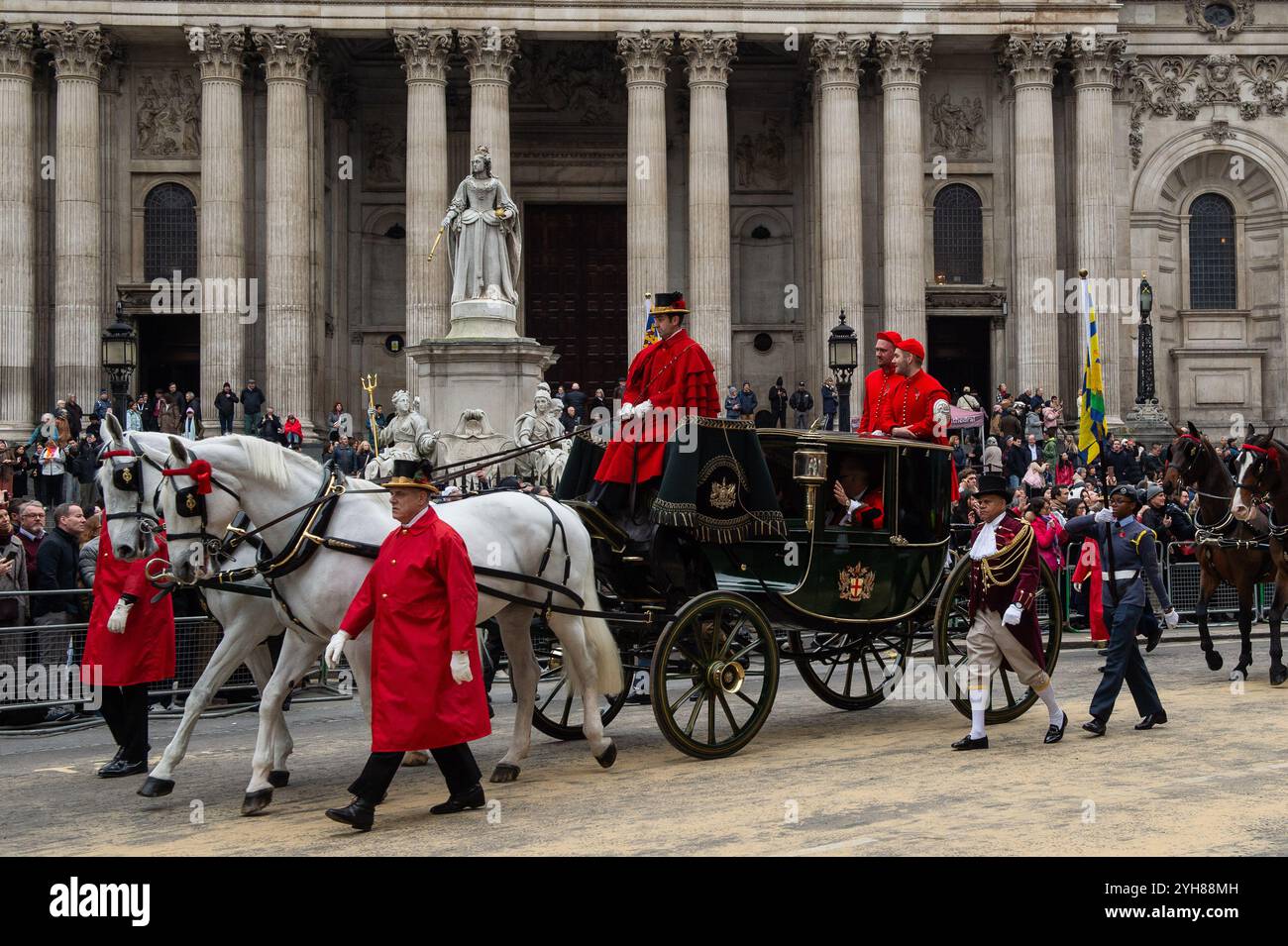Participants in vibrant costumes and historic attire march in the ...