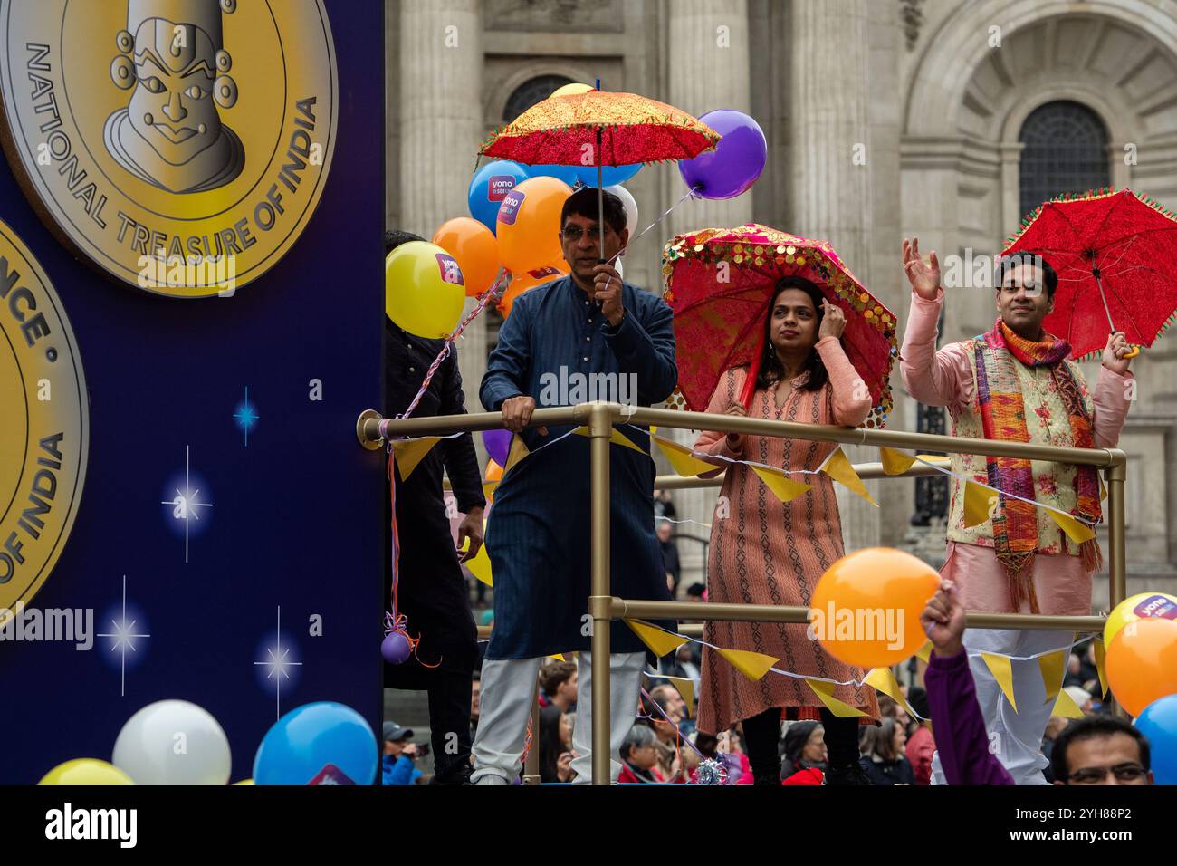 Participants in vibrant costumes and historic attire march in the ...