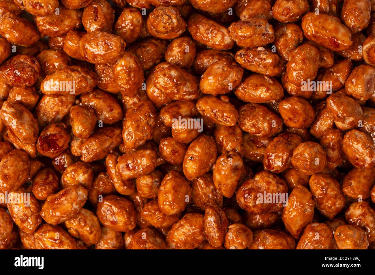 Tasty sweet roasted peanuts as a background Stock Photo - Alamy
