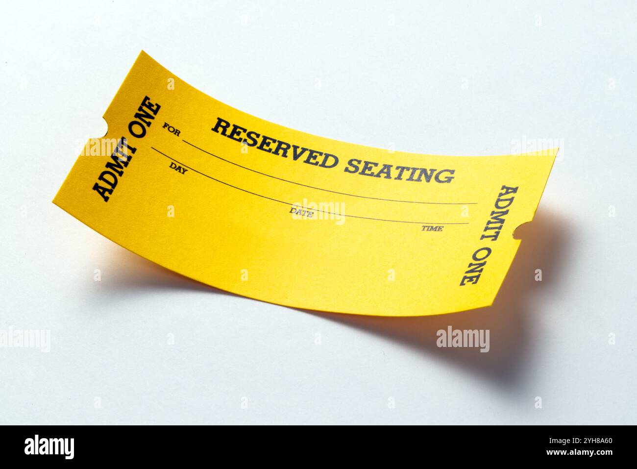 Yellow vintage admission ticket isolated on white background Stock ...