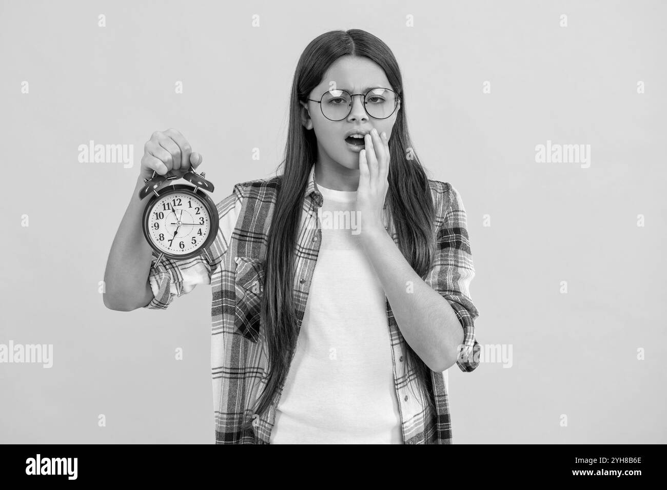 school time schedule. teen girl with alarm clock. Time ticking for a ...