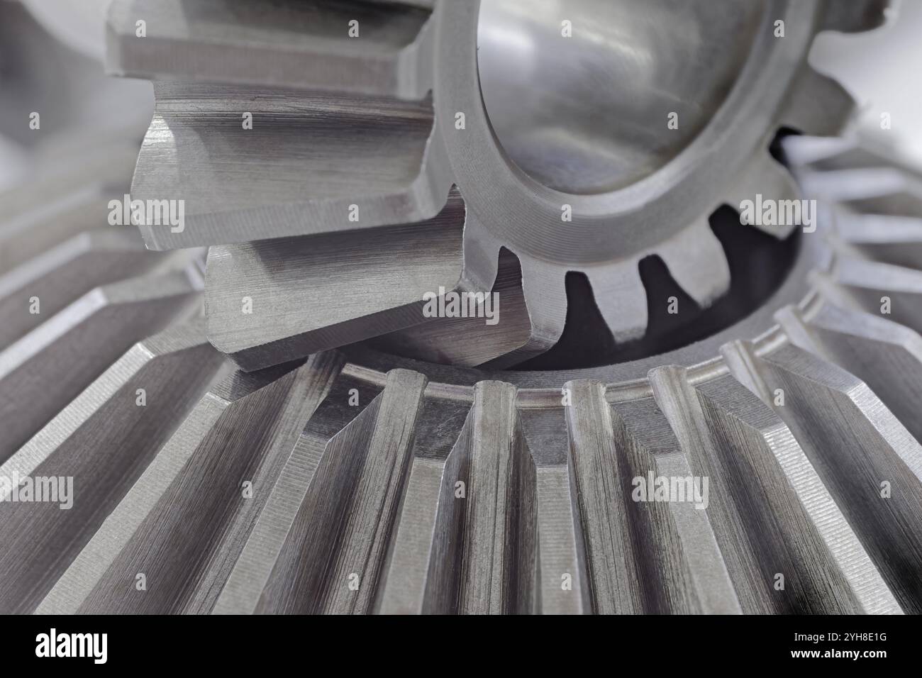 Two bevel gears, part of crossed gear transmission, close up shot ...