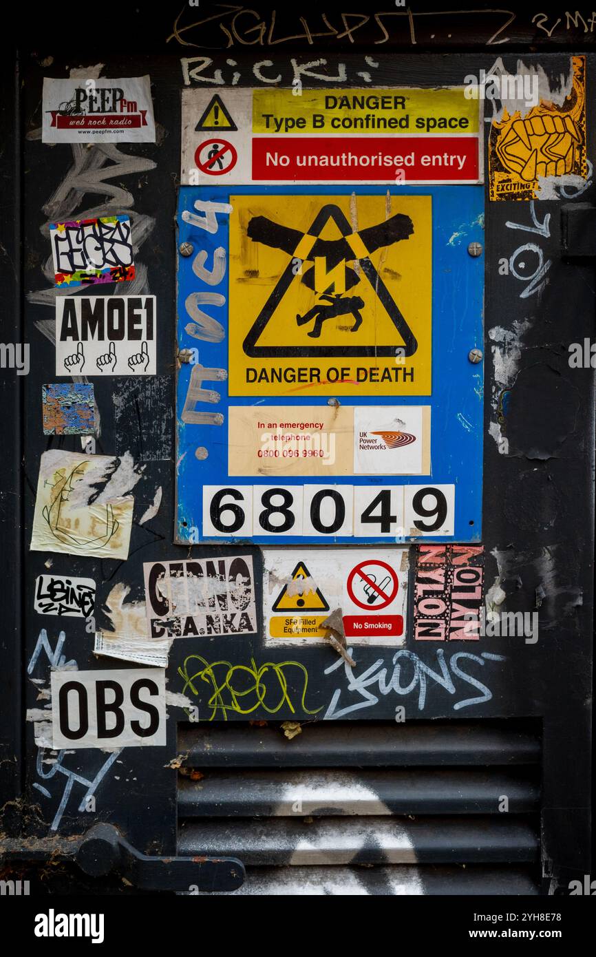 Damaged Safety Notice - Grafitti and sticker obscured Electrical Safety ...
