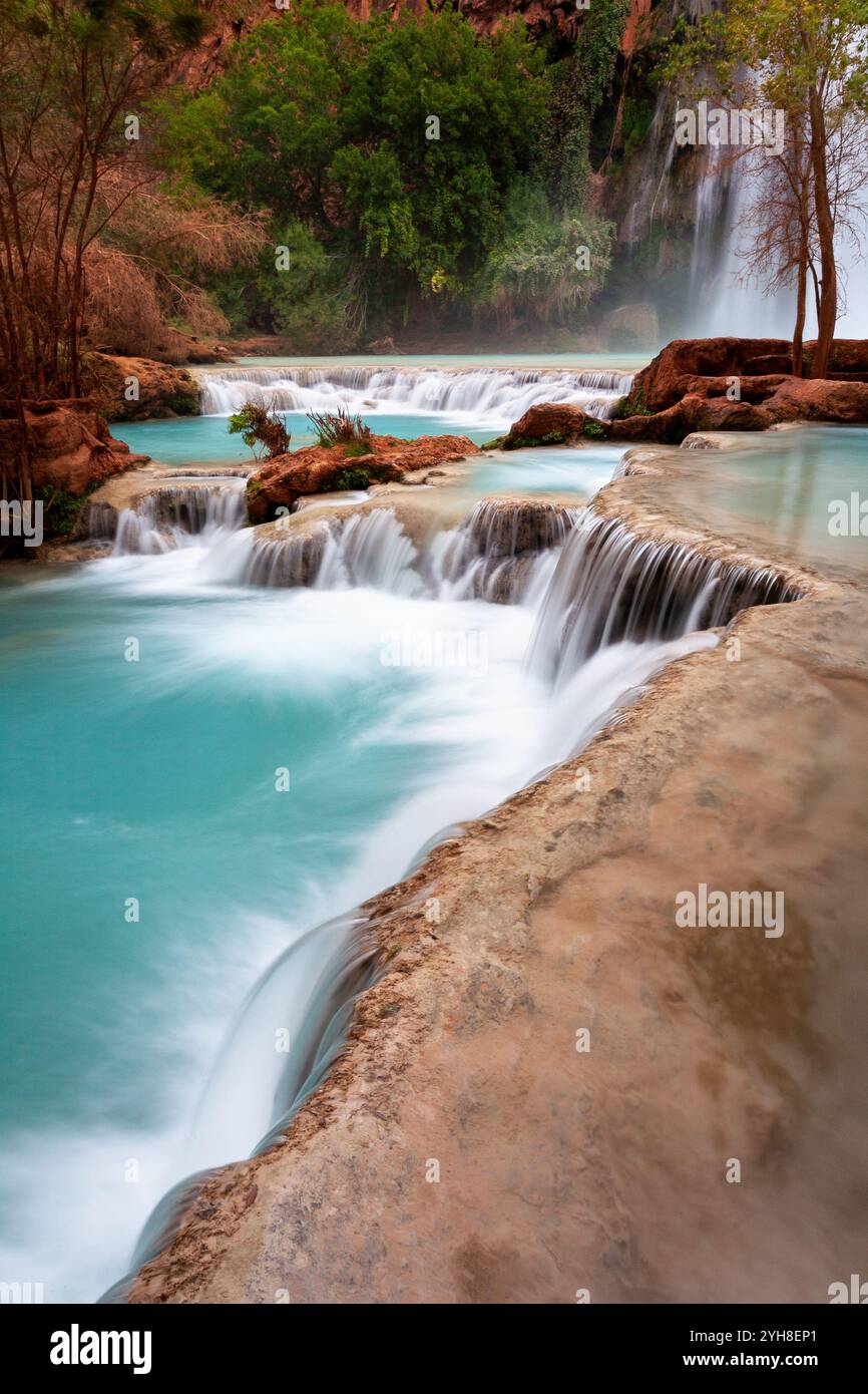 Small waterfalls pouring from turquoise pools below Havasu Falls in the ...