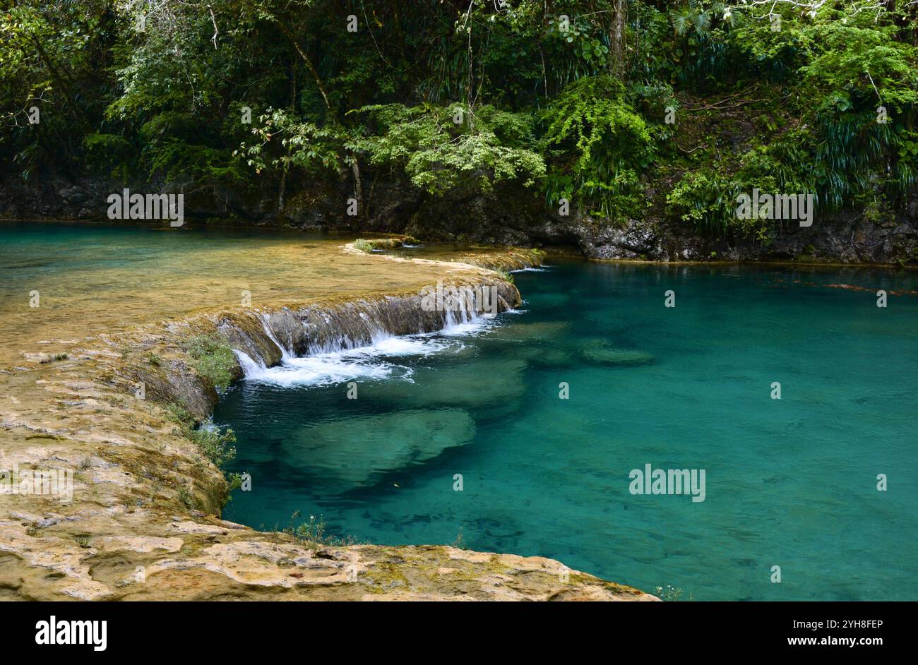 Landscape of an idillyc waterfall with turqouise natural swimming pools ...