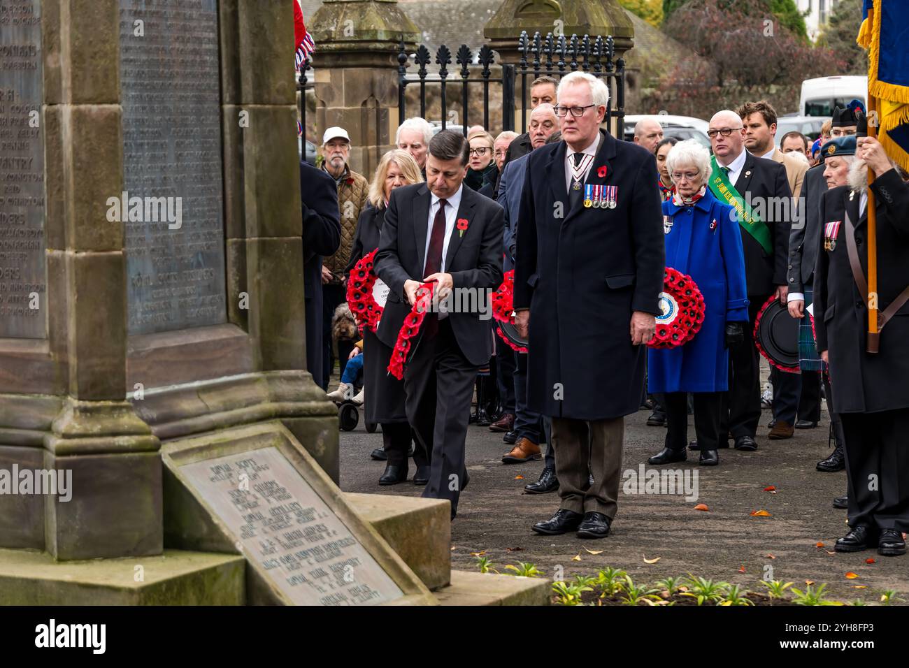 MP Douglas Alexander lays a poppy wreath on Remembrance Sunday at war ...