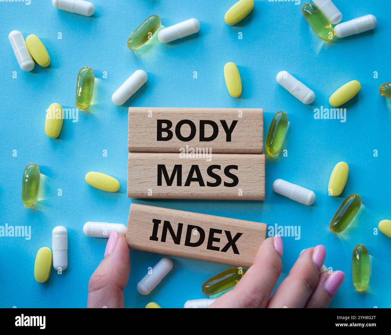 Body Mass Index symbol. Concept word Body Mass Index on wooden blocks ...