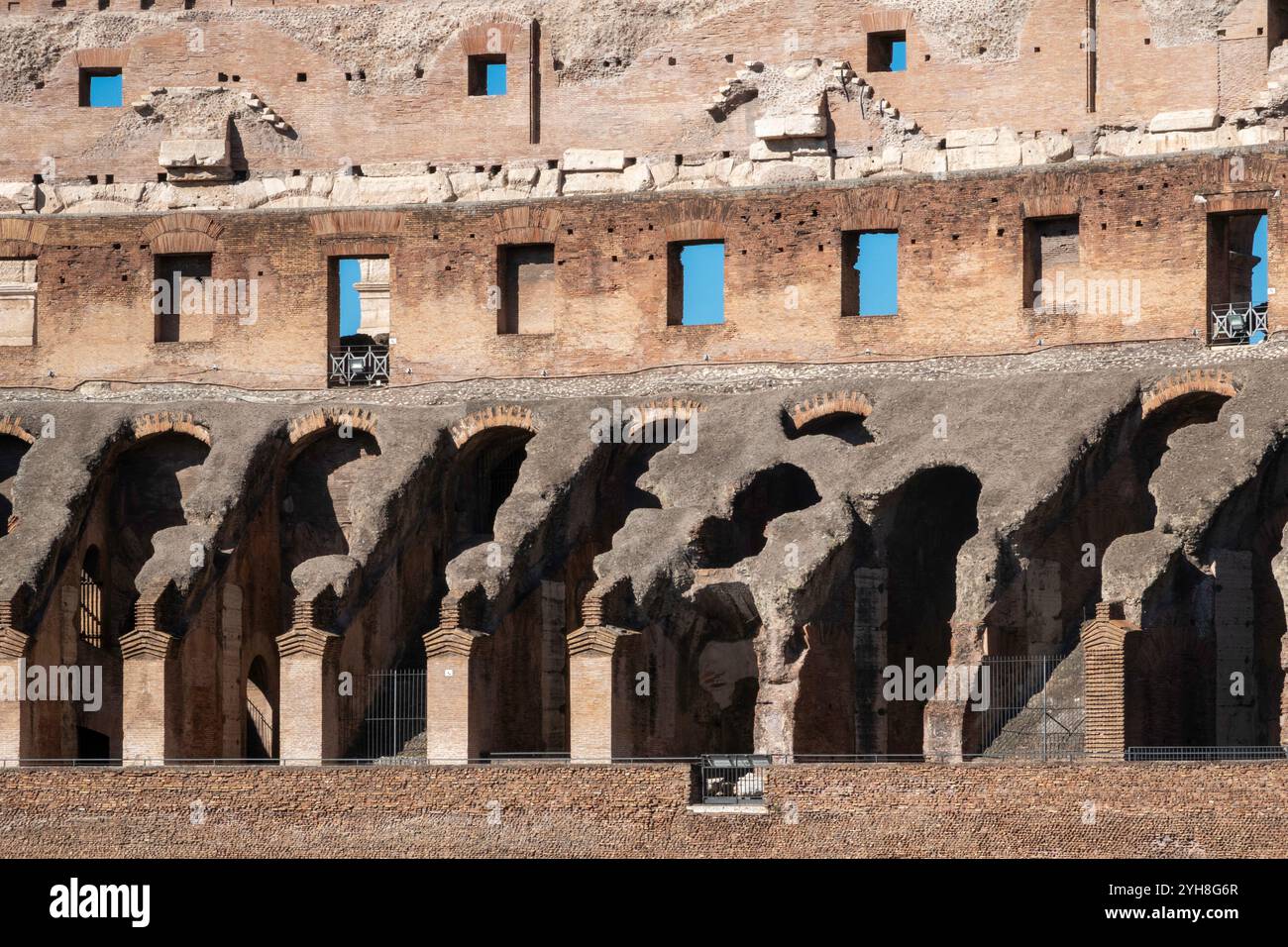 Architectural detail of the Colosseum in Rome. This majestic iconic ...