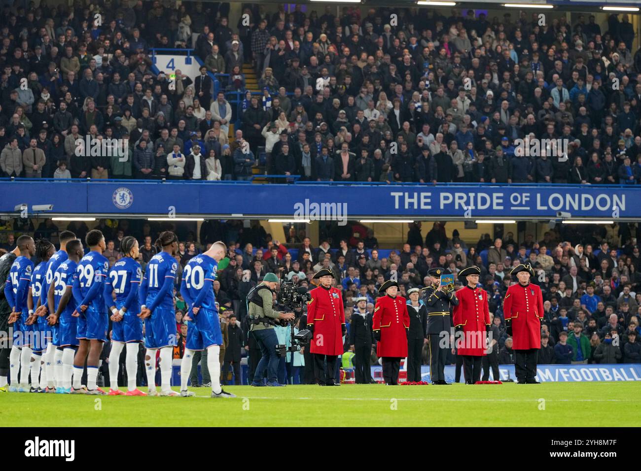 A soldier plays The Last Post bugle call on the pitch to mark ...