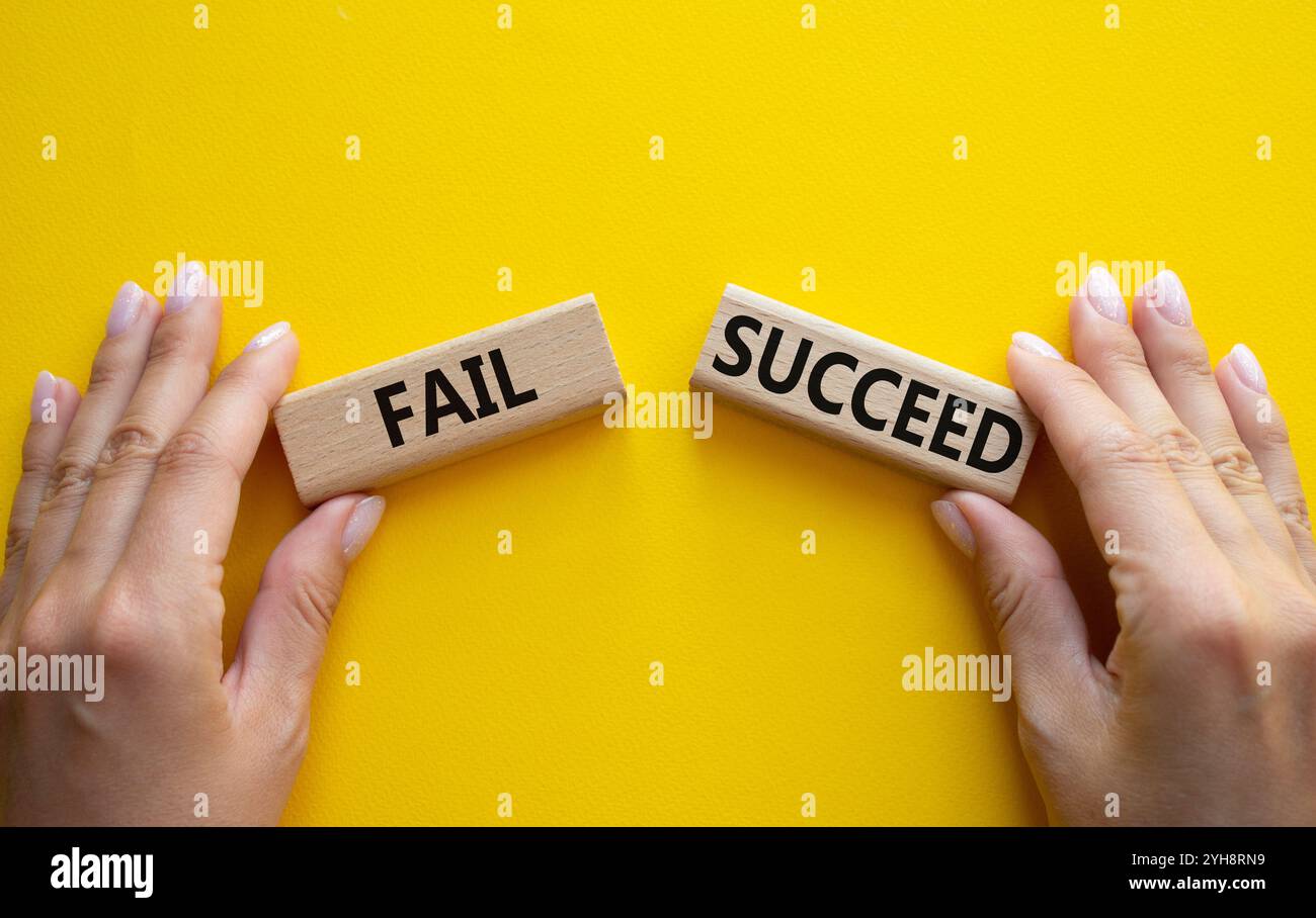 Fail or Succeed symbol. Concept word Fail or Succeed on wooden blocks ...