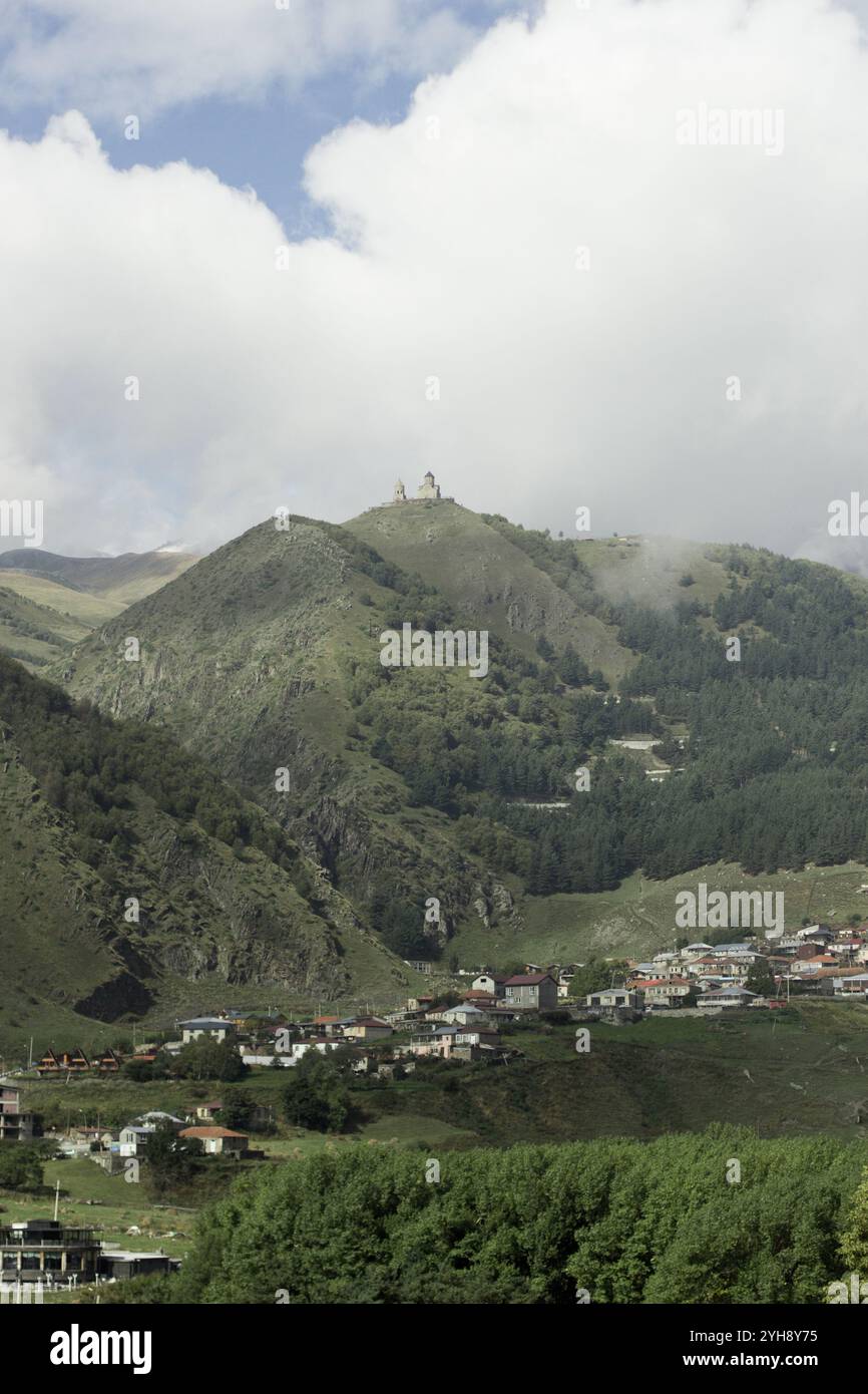 This vertically-oriented photograph captures the tranquil beauty of a ...