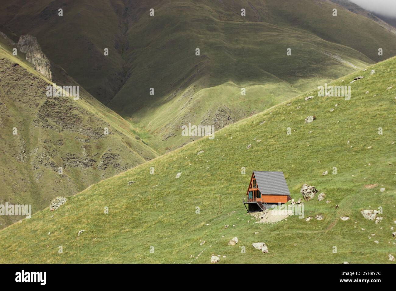 This horizontally-oriented photograph depicts a picturesque autumn ...