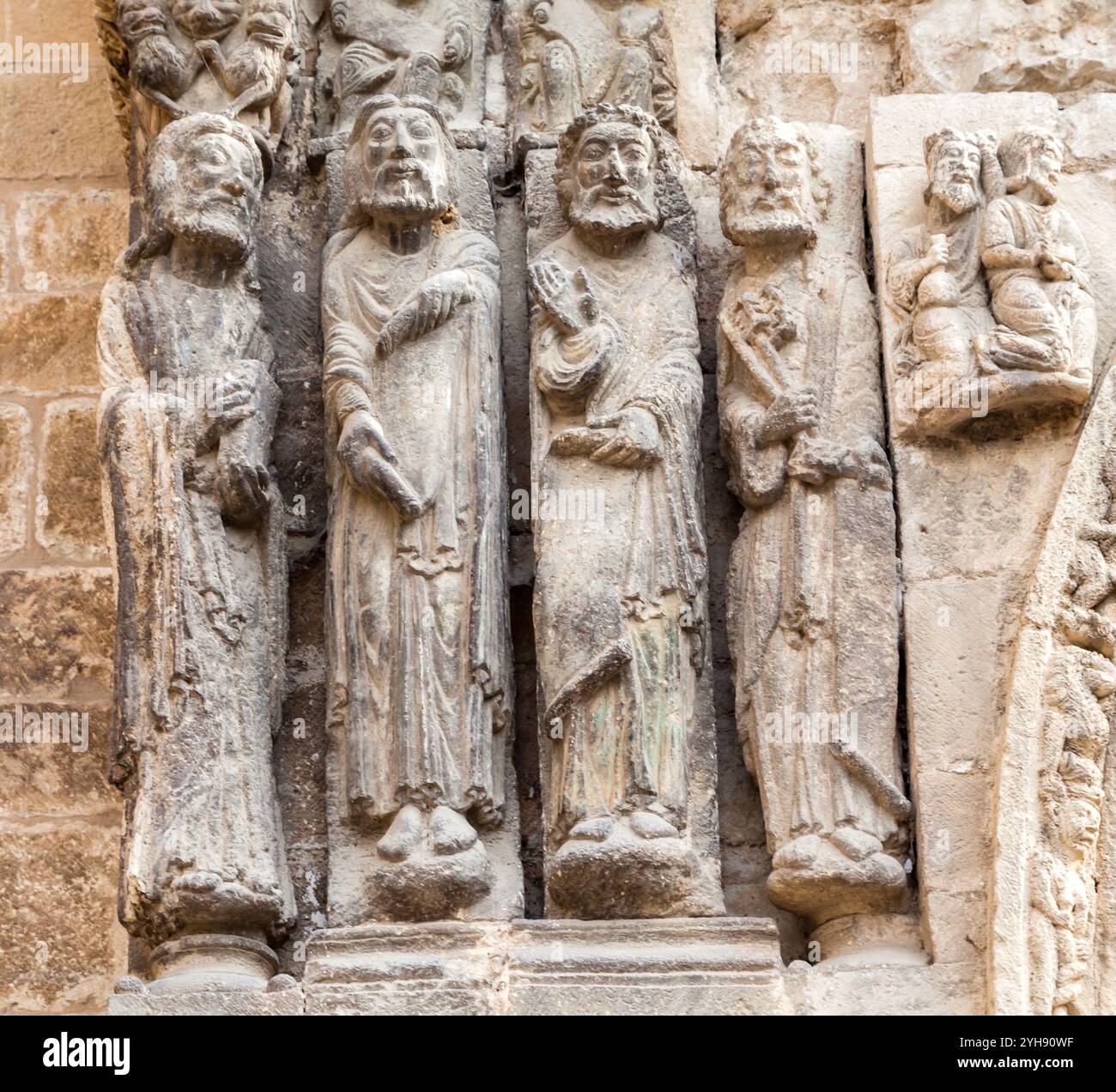 A detailed relief sculpture showcases biblical figures and scenes ...