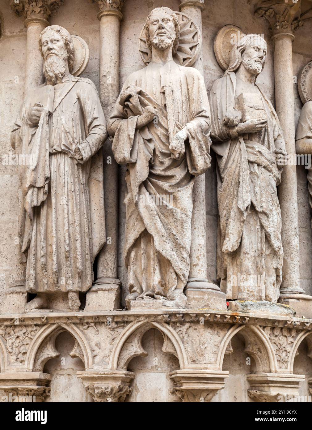Intricate stone sculptures of religious figures enhance the ...