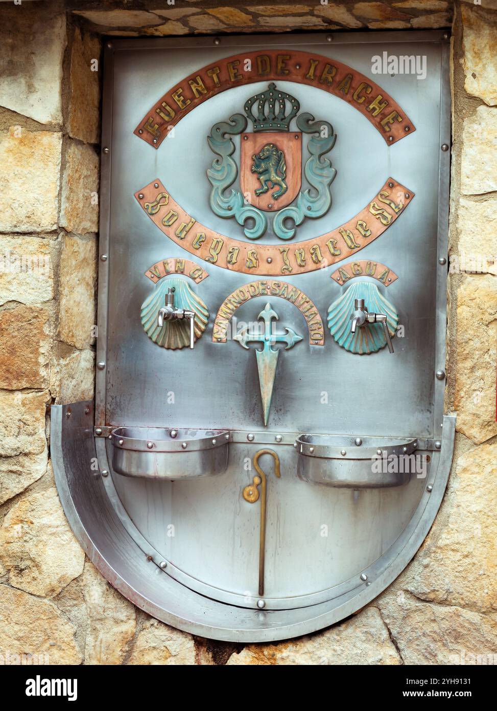 Pilgrims on the Camino de Santiago enjoy free wine from Fuente del Vino ...