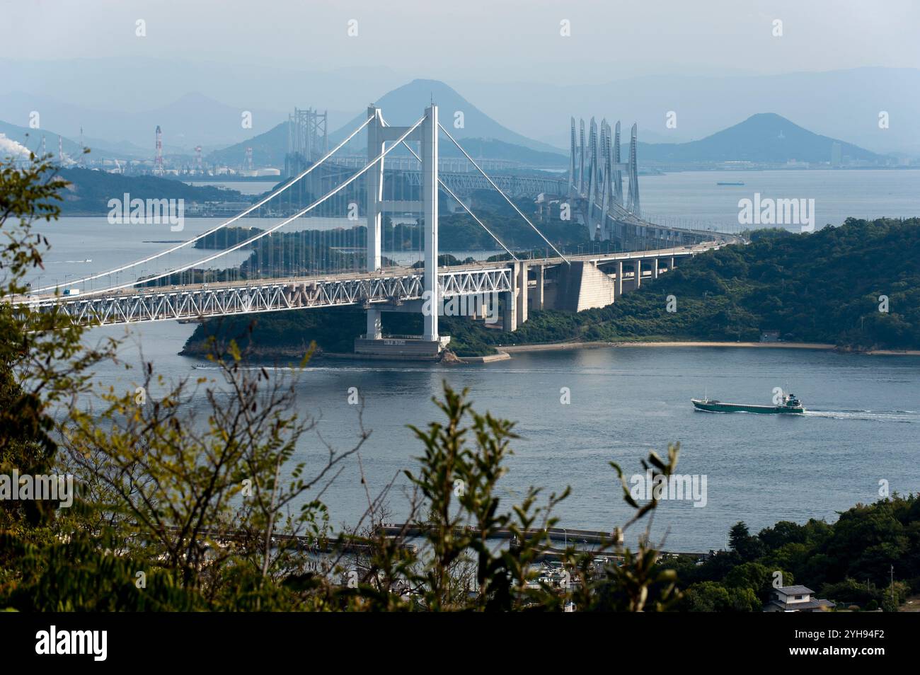 Cars crossing over the Shimotsuiseto Ohashi (Shimotsui-Seto Bridge) and ...