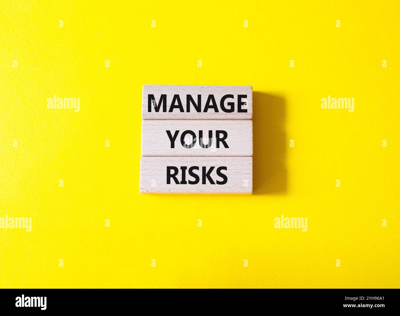 Manage your Risks symbol. Concept words Manage your Risks on wooden ...