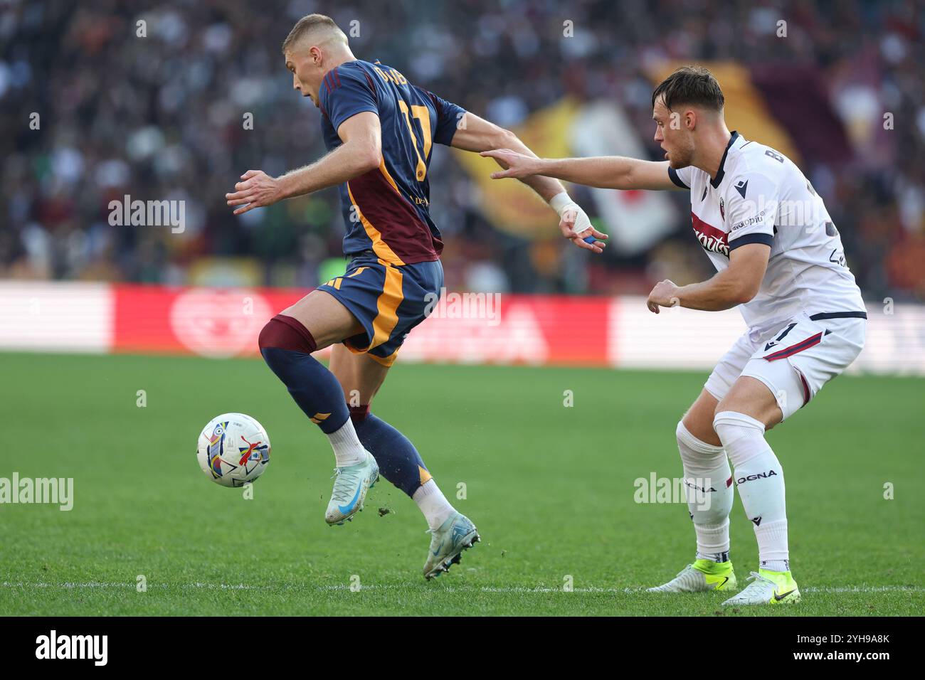 Rome, Italy 10.11.2024 : Artem Dovbyk of Roma, Sam Beukema of Bologna ...