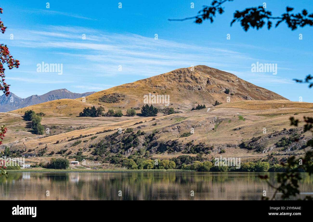 Gorgeous views of lake hayes in New zealand clear day hills Stock Photo ...