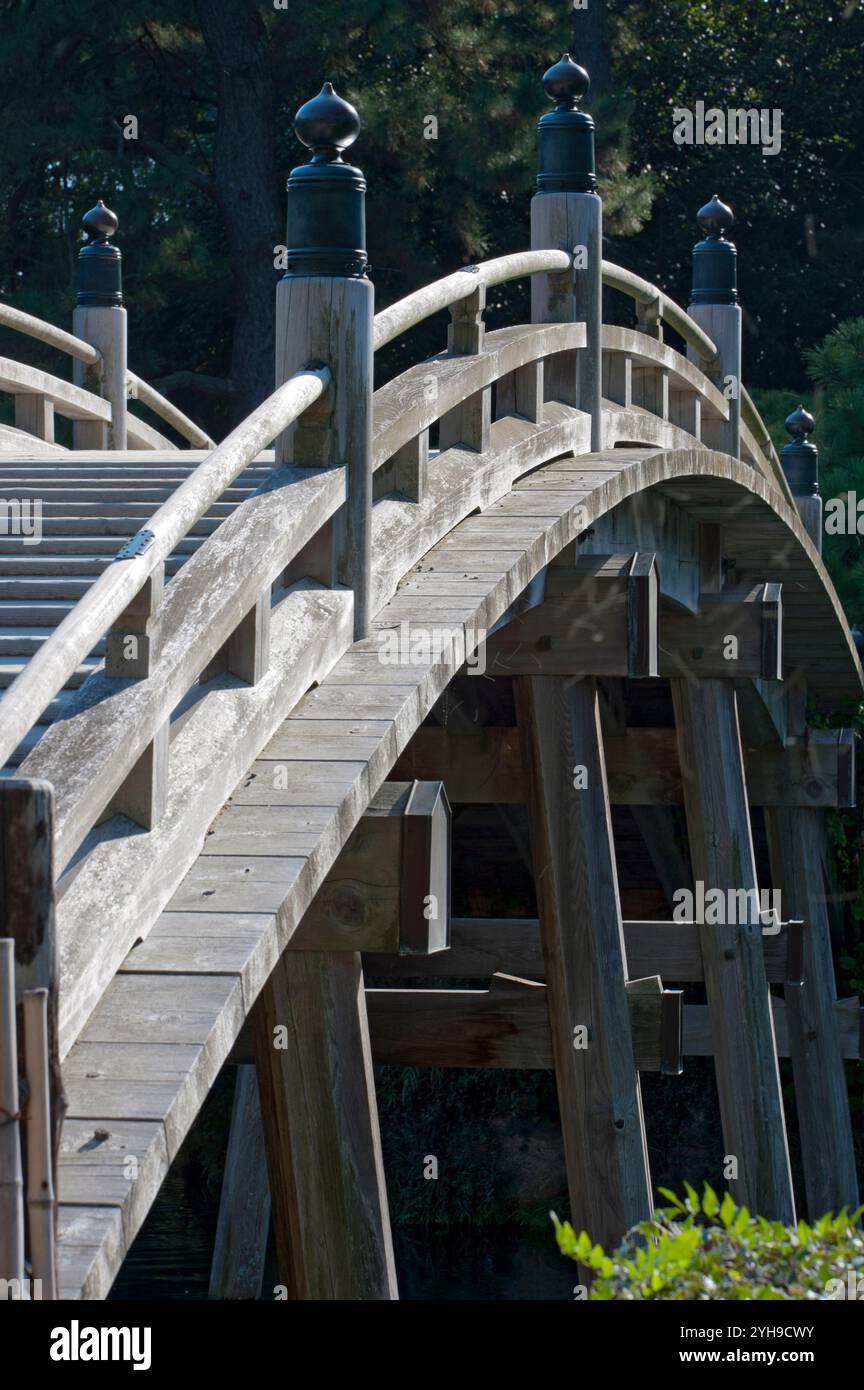 The arched wooden bridge called Engetsu-kyo at Ritsurin Koen Japanese ...