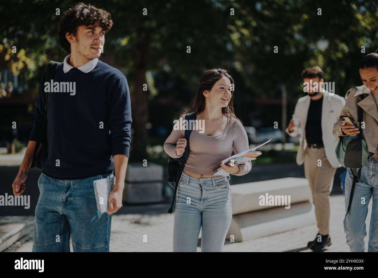 Group diverse students bags hi-res stock photography and images - Alamy