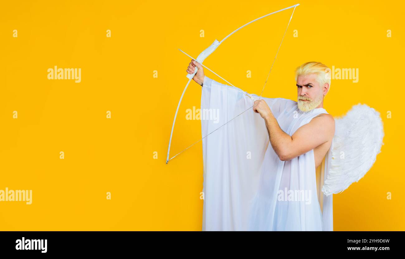 Valentines Day. Male angel with bow and arrows. Bearded man with angel ...