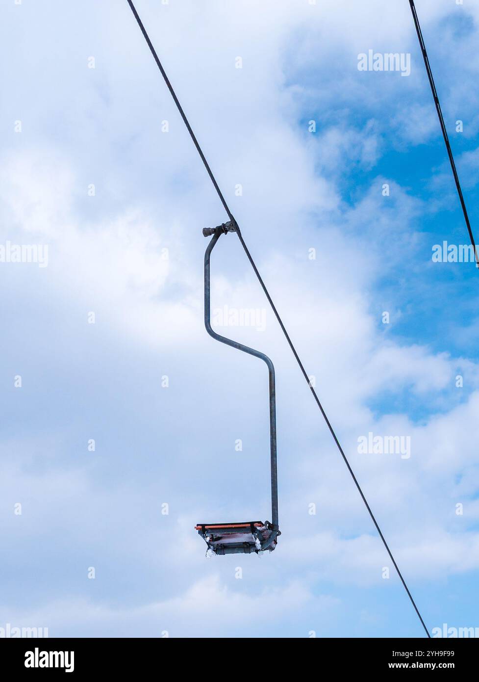 Old "Pizza box" style single person ski chairlift at Madarao in Nagano ...