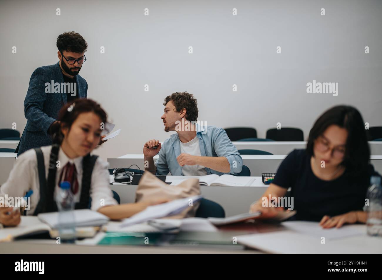 College students collaborating professor hi-res stock photography and ...