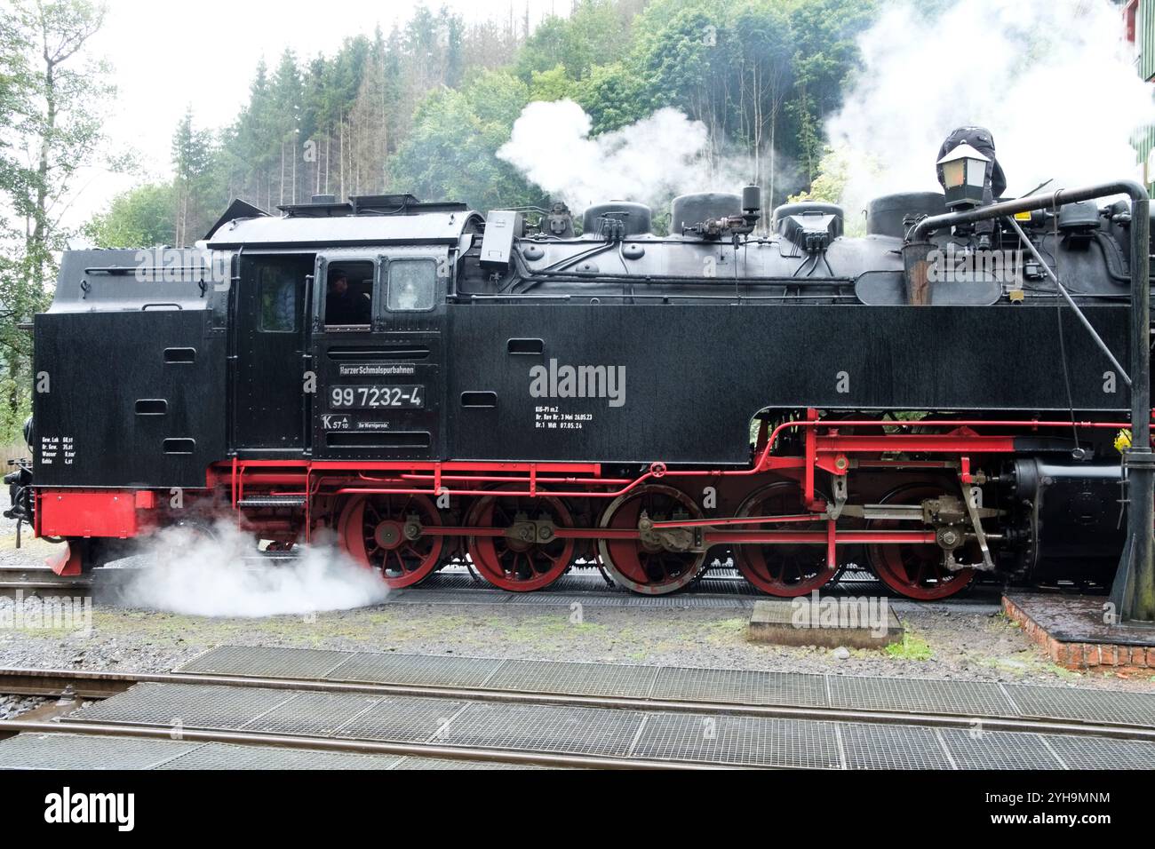 Water stop for 2-10-2 tank locomotive (99231-4) at the junction of ...