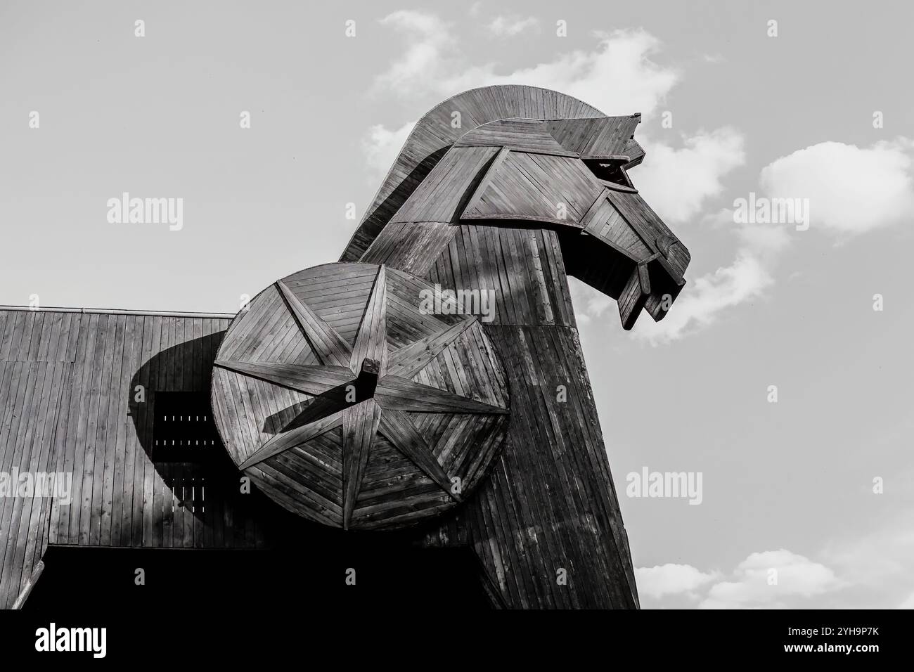 A large wooden structure resembling the Trojan Horse, an iconic ...