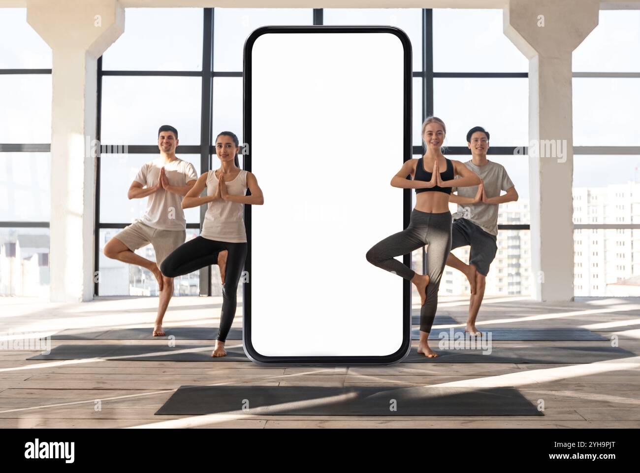 Group four people practicing yoga hi-res stock photography and images ...