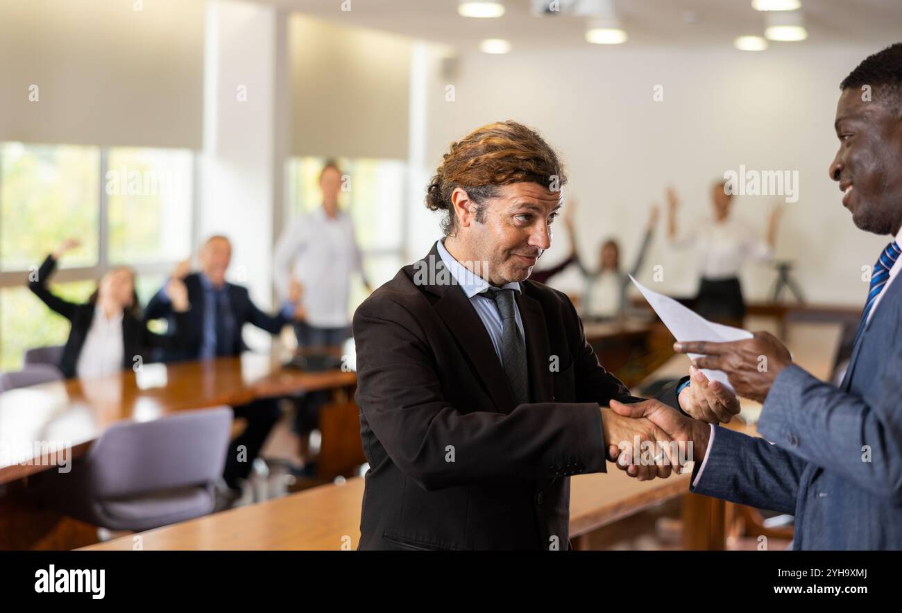Male job applicant signing new hi-res stock photography and images - Alamy