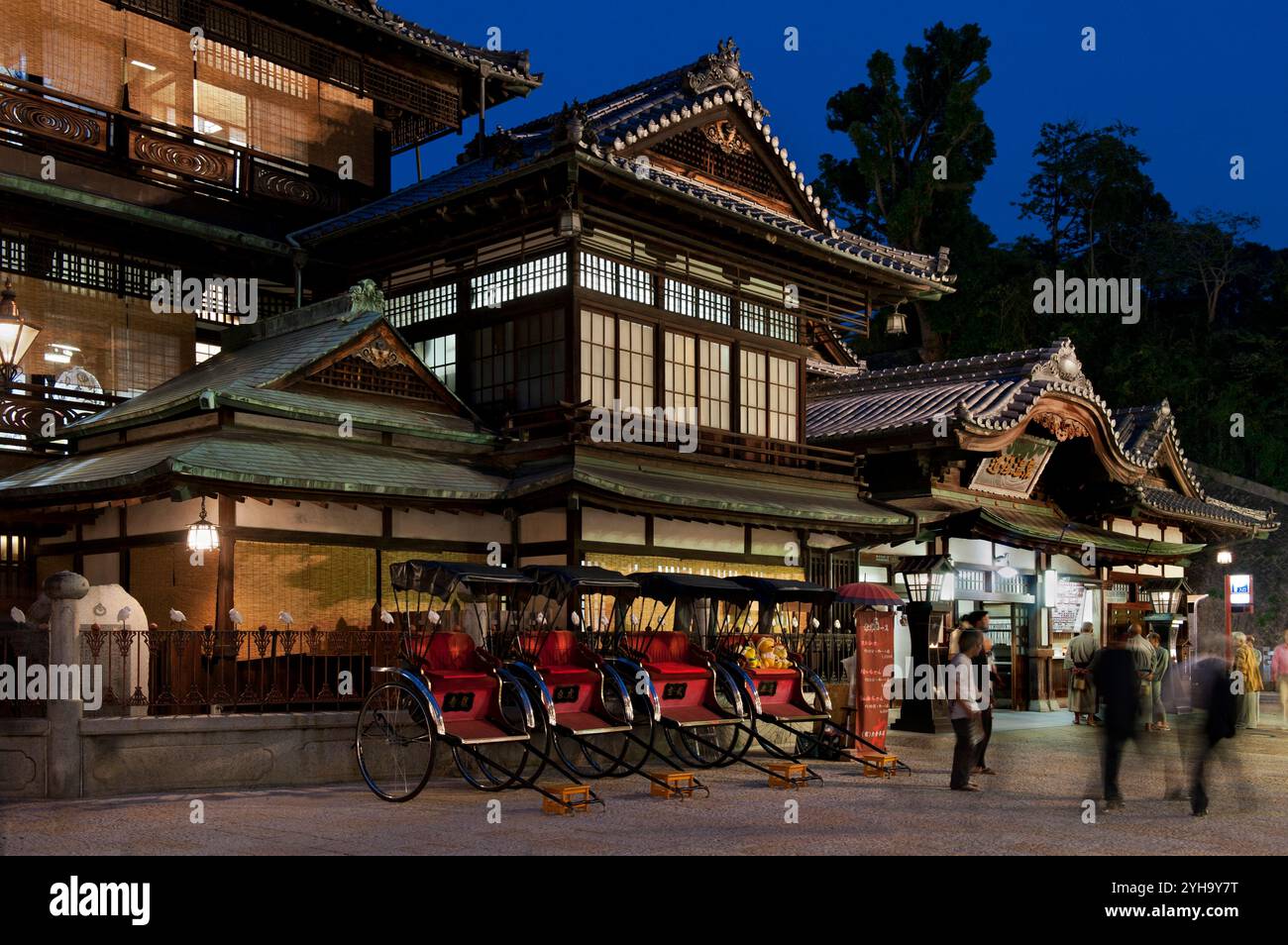 Visitors to the "honkan," or main building, at Dogo Onsen hot spring ...