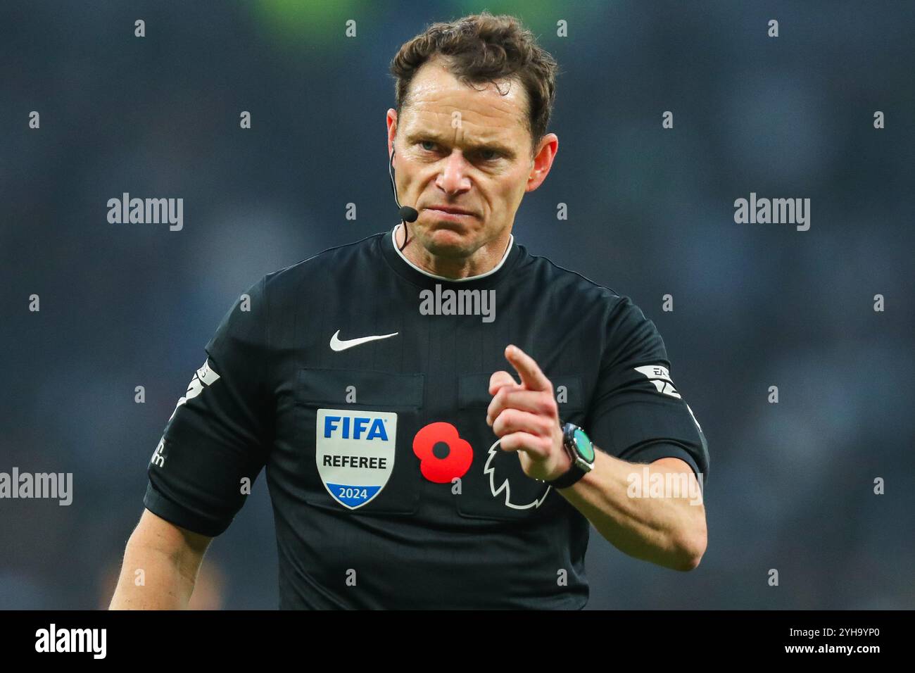 Referee Darren England gives instructions during the Premier League ...