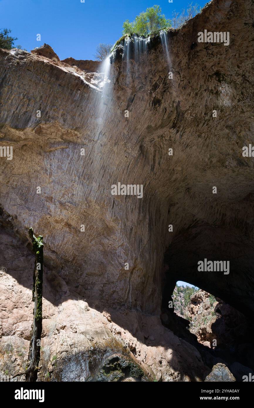 A light waterfall pouring over Tonto Natural Bridge. Tonto Natural ...