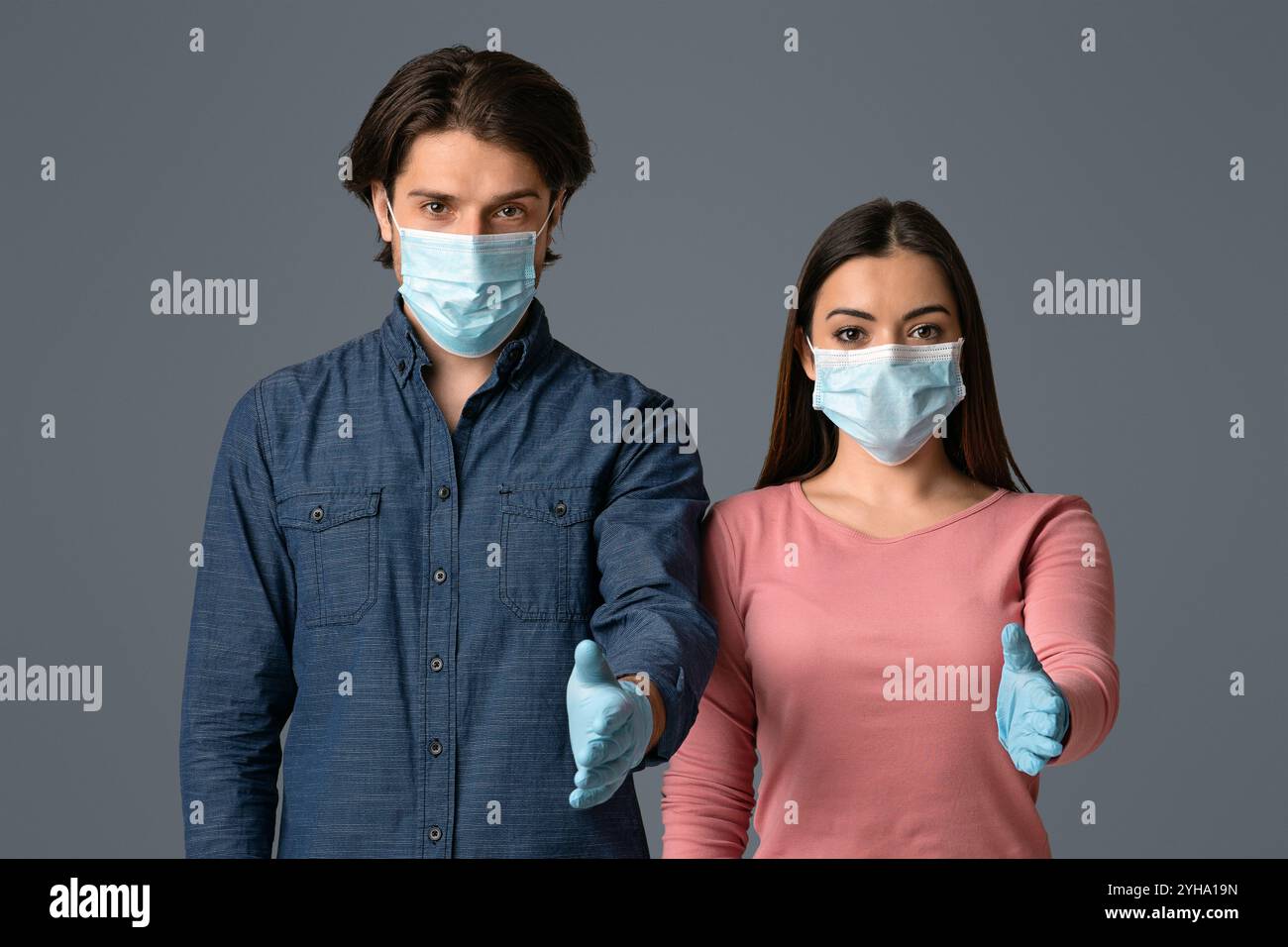 Man extending hand in help hi-res stock photography and images - Alamy