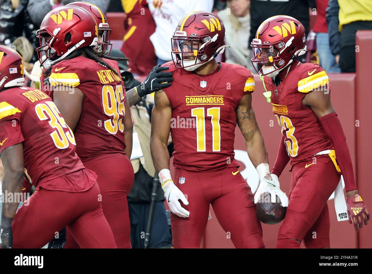 Washington Commanders safety Jeremy Chinn (11) celebrates during an NFL ...