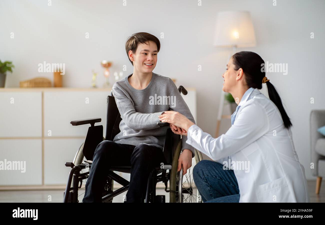 Disabled people healthcare support. Doctor holding hands of handicapped ...