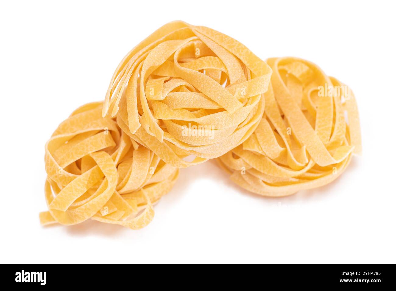 Three Classic Italian Raw Egg Fettuccine - Isolated on White Background ...